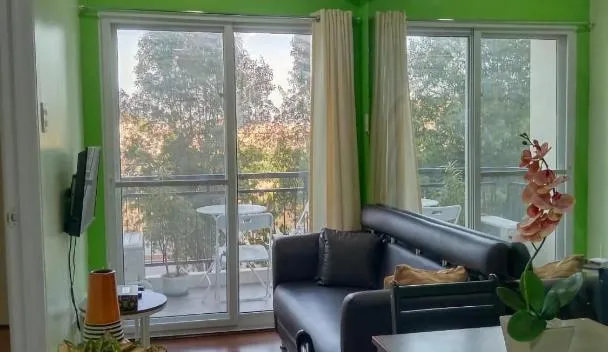 1BR Condo w Pool & Balcony Near Robinson Place - F&M Homes - Sitio Uno ...