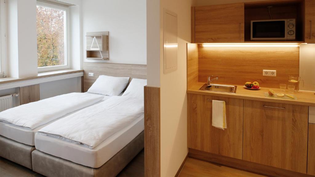 A2 Boarding House Memmingen Serviced apartment - Deals, Photos & Reviews