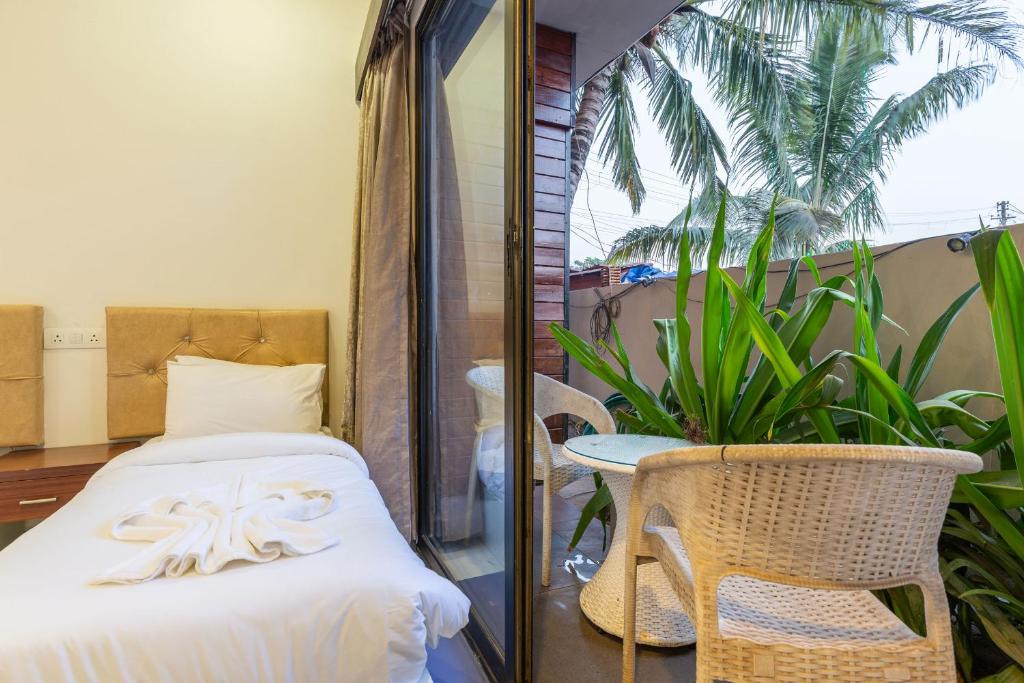 Best Price on Amara Oceanfront Resort and Club Baga in Goa + Reviews!