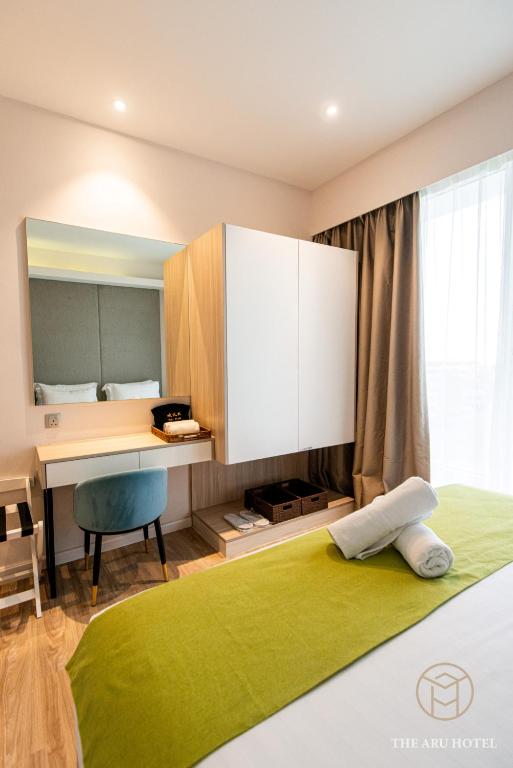 Best Price on The Aru Hotel at Aru Suites in Kota Kinabalu + Reviews!
