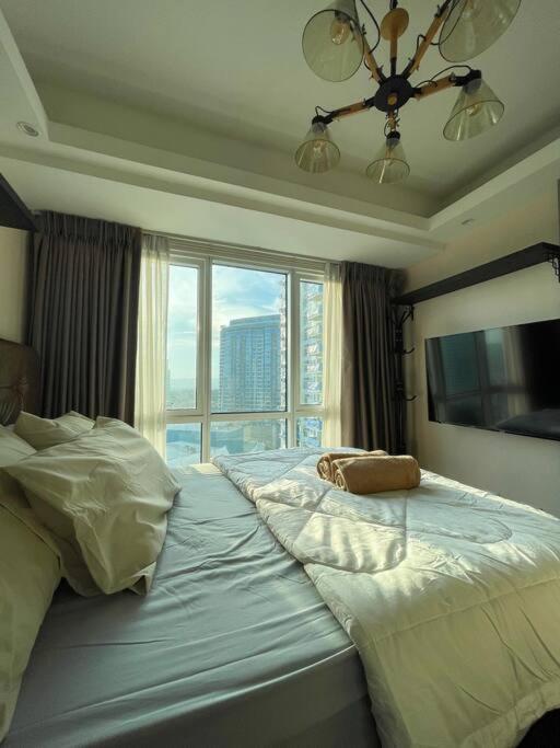 From $14 - Contemporary Studio Unit at Abreeza T1 with Paid Parking ...