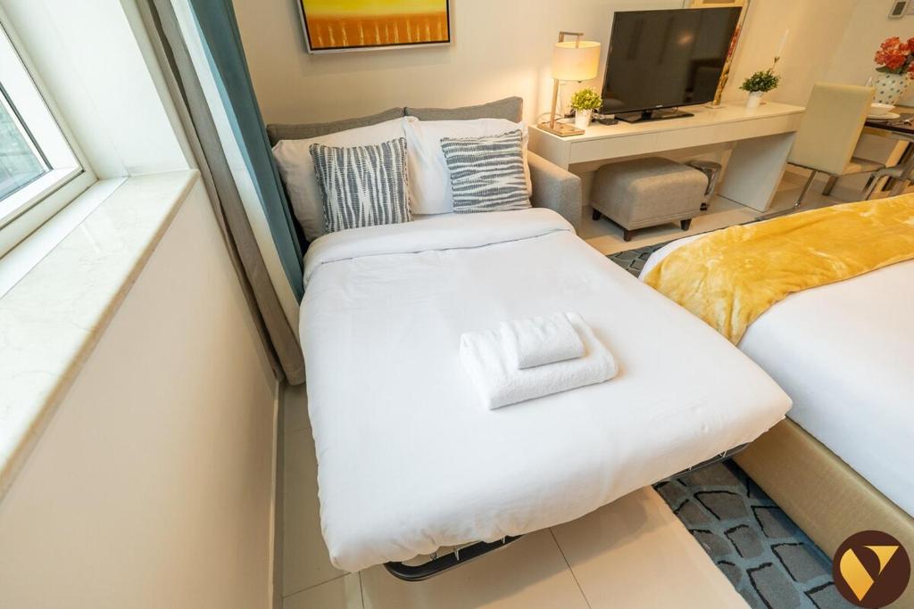 From $41pp - Vogue DAMAC Maison Cour Jardin Studio Pool & Gym Access, Dubai