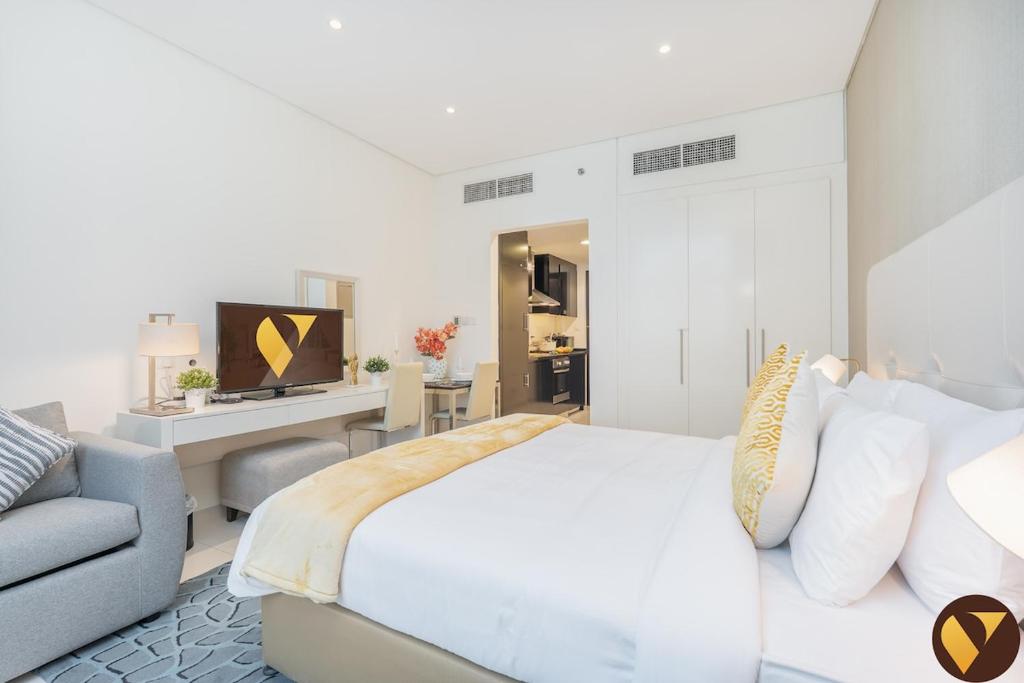 From $41pp - Vogue DAMAC Maison Cour Jardin Studio Pool & Gym Access, Dubai