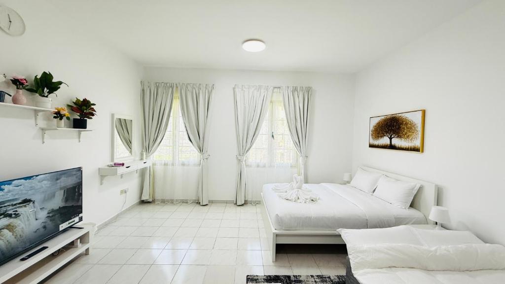 From $76 - Z01 Furnished Studio Garden view International city, Dubai