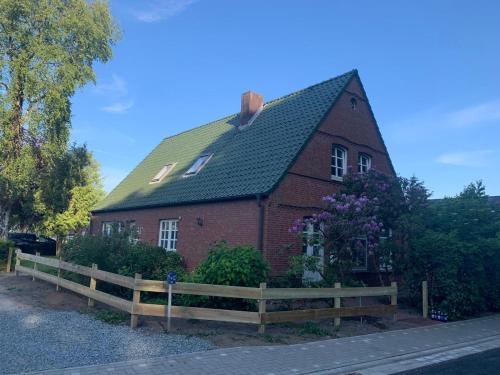 Ferienwohnung Hochdorfer Garten - Tating