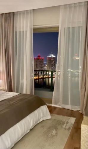 Beachfront Luxury Apartment-pearl Island شقه مطله على الشاطئ بجزيرة اللؤلؤه - Doha
