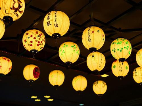 Watch the clear stream of Shima River from the giant open-air bath at ...