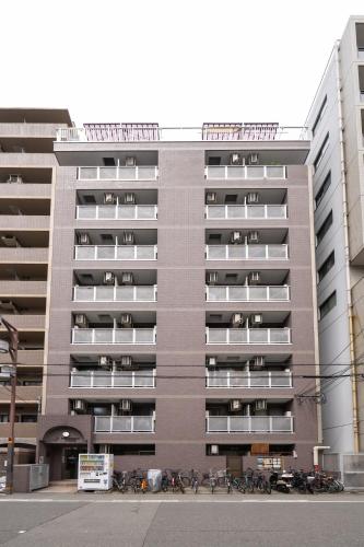 難波駅、道頓堀のそばでシンプルステイ　ベッド3台のお部屋 - Dotonbori