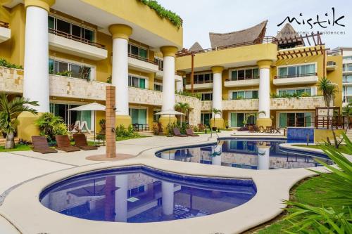 NEW Pueblito Escondido Condos, 2 Pools with Oceanview and Roof Lounge, Steps to Beach Deals ...