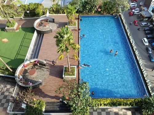 Tranquil Studio At Vida View Makassar By Travelio - Macasar