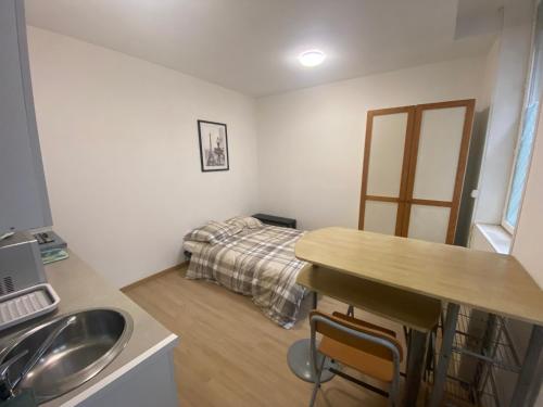 Le pied du Beffroi d'Arras - Location saisonnière, Rez de Chaussée 4 ...