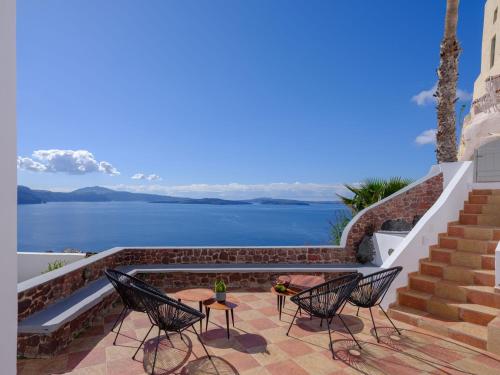 Caldera Whisper Caves - Oia