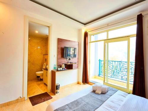 Hotel Pride Inn By Maps Hospitality - Near To Lakshman Jhula & Ghat - Rishikesh