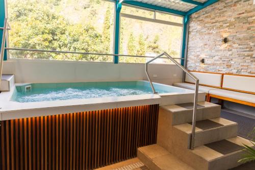 Xperience Hotel - Banos