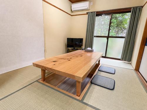 ゲストハウスSato木のぬくもりに包まれる和の一棟貸しsato - Shima