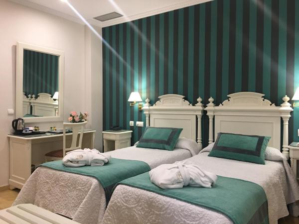 Adriano Boutique Sevilla - Camas