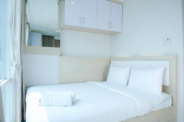 Cozy Minimalist 2br With City View At Atlanta Apartment By Travelio - Cibubur