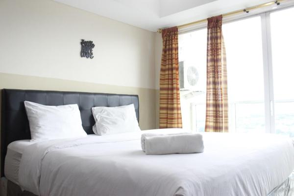 Modern Studio Room At Tamansari La Grande Apartment By Travelio - Bandung