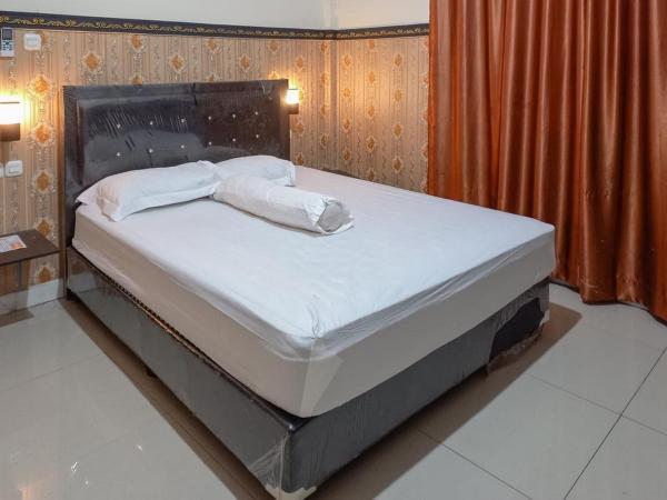 Homestay Singgasana Mitra Reddoorz - North Sulawesi