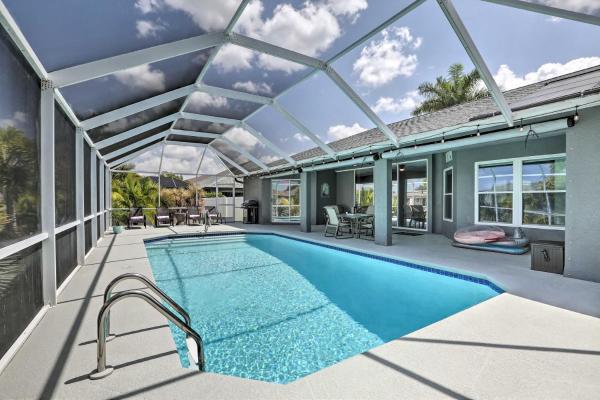 Private Pool And Canal Views Home In Cape Coral - Cape Coral, FL