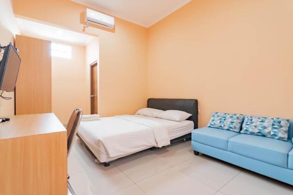 Shofy Guest House Mitra Reddoorz - Bandung