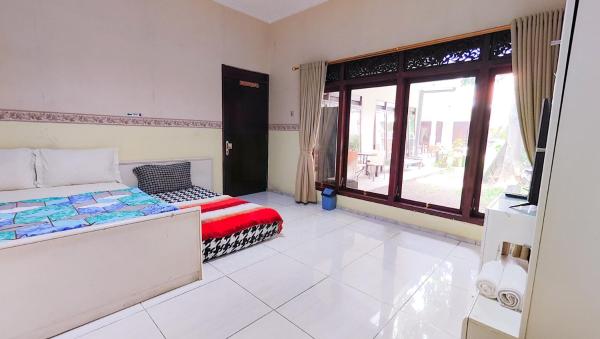 Homey Guesthouse Near Sby Zoo Syariah - Surabaya