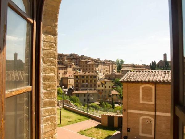 Guesthost - Bea Boutique House - Siena