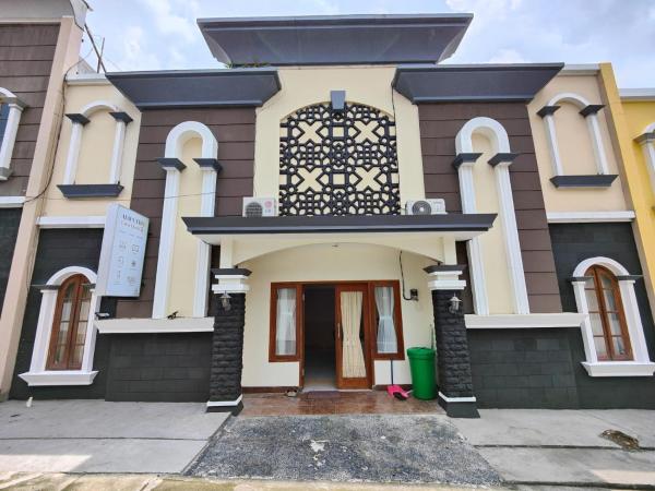 Adiputra Guesthouse Homiq - Yogyakarta