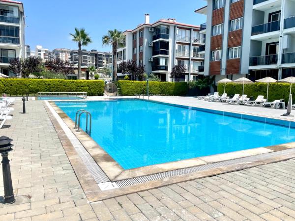 Theos Holiday Apartments - Kuşadası