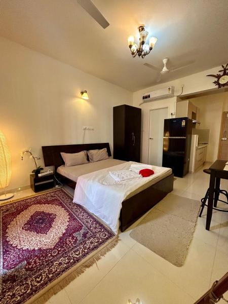 Good Stay Pool View Stylish Studio Apartment,6km From Airport, 307 - Goa