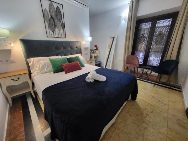 Casona De San Andrés Boutique Hotel - Camas
