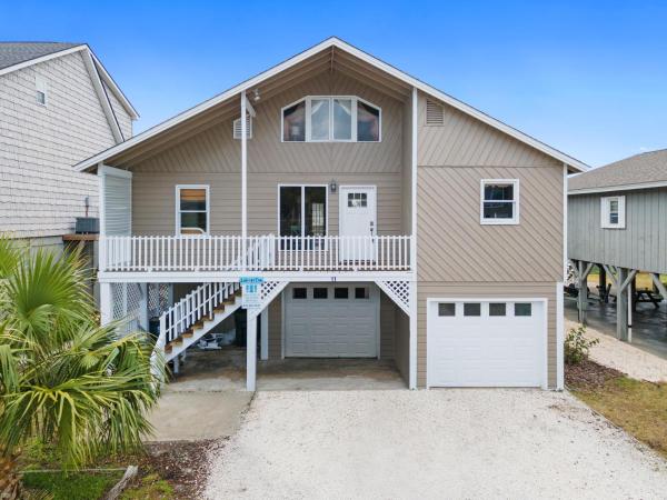 Isle Of A Time Brunswick Vacation Rentals Canal Front With Boat Slip - Ocean Isle Beach, NC