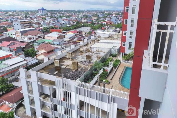 Cozy And Best Deal Studio Apartment Vida View Makasar By Travelio - Makassar