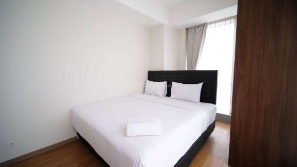 Simple And Clean 2br At Grand Sungkono Lagoon Apartment By Travelio - Surabaya
