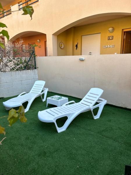 Bajo Con Jardín A Pie De Playa Y Piscina Comunitaria Con Jacuzzi - Vera