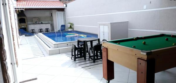 "Lindíssima Casa Pé Na Areia Com Piscina Aquecida Cobrado A Parte, Sala De Jantar, 3 Amplos Quartos, Sendo1suíte, Amplo Espaço De Lazer Com ÁRea Gourmet Em Deck Coberto Com Churrasqueira E Mesa De Bilhar Frente A Piscina, Super Pertinho Da Praia" - Praia Grande