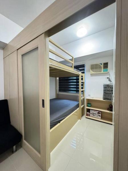 Cozy Condo By The Mrt & Light Mall Experience Comfort And Convenience - Makati