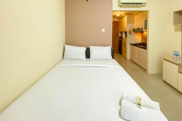 Cozy Stay And Tidy Studio Apartment Woodland Park Residence By Travelio - Cawang