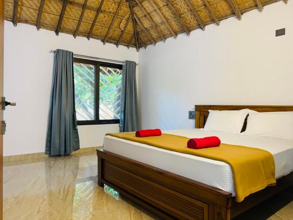 Hampi Village Resort & Tutti Cafe - Hampi