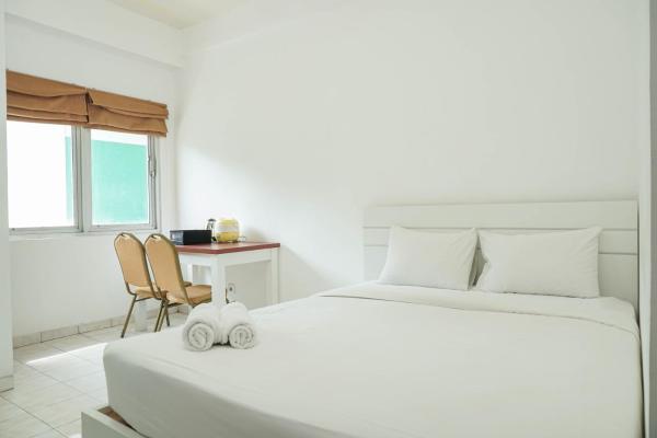 Homey Studio Margonda Residence 1 Apartment By Travelio - Jakarta