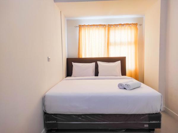 Luxurious 1br At Vida View Makassar Apartment By Travelio - Makassar