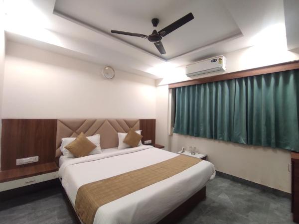 Hotel Earth Inn, Subhash Bridge, Rto Circle, Ahmedabad - Ahmedabad