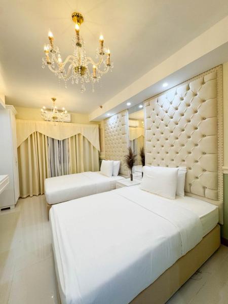 Homefort Twin Bed Suite - Red Residences Makati 2202 - Manila