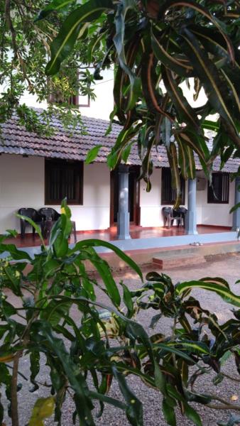 Perch Next Door - Thalassery