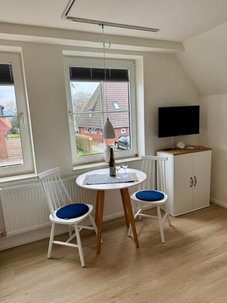 Lüttje Ginsterhuus - Ferienwohnung Wilde Brise - Norderney