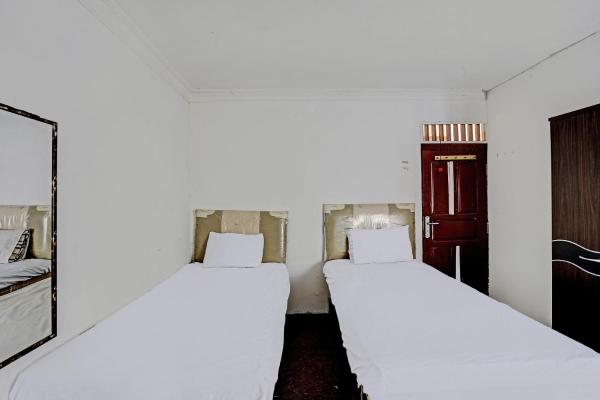 Spot On 92529 Penginapan Wisma Bintang Syariah Near Mts Al Ma'arif Kota Bangun - North Kalimantan