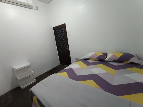 Penginapan Violet Doorz Syariah - Alaska