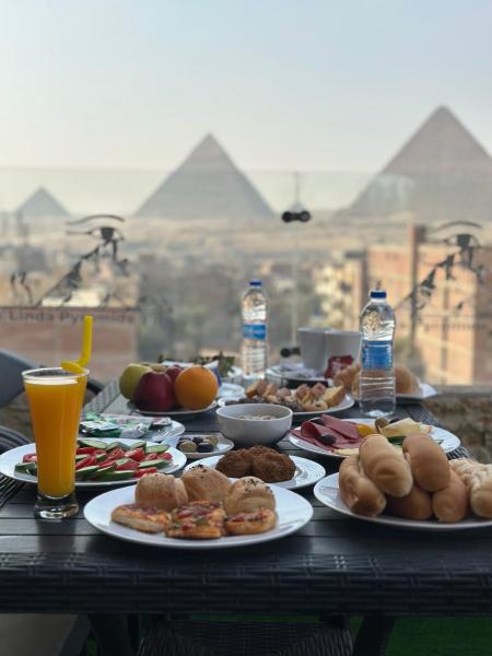 Linda Pyramids View - Giza