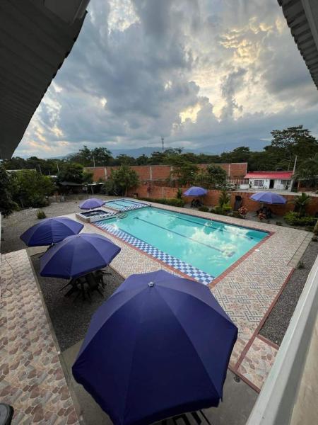 Hotel Y Piscina Malecón - Acacias