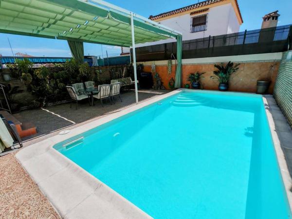 A Un Metro Sevilla - Sevilla, España